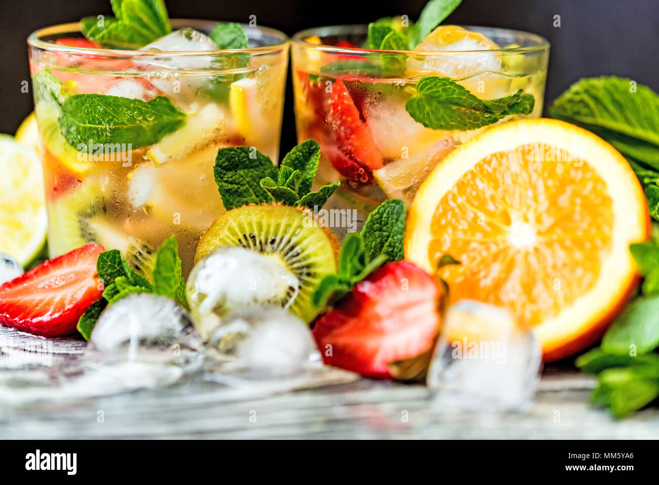 Homemade lemonade with fruit and mint Stock Photo - Alamy