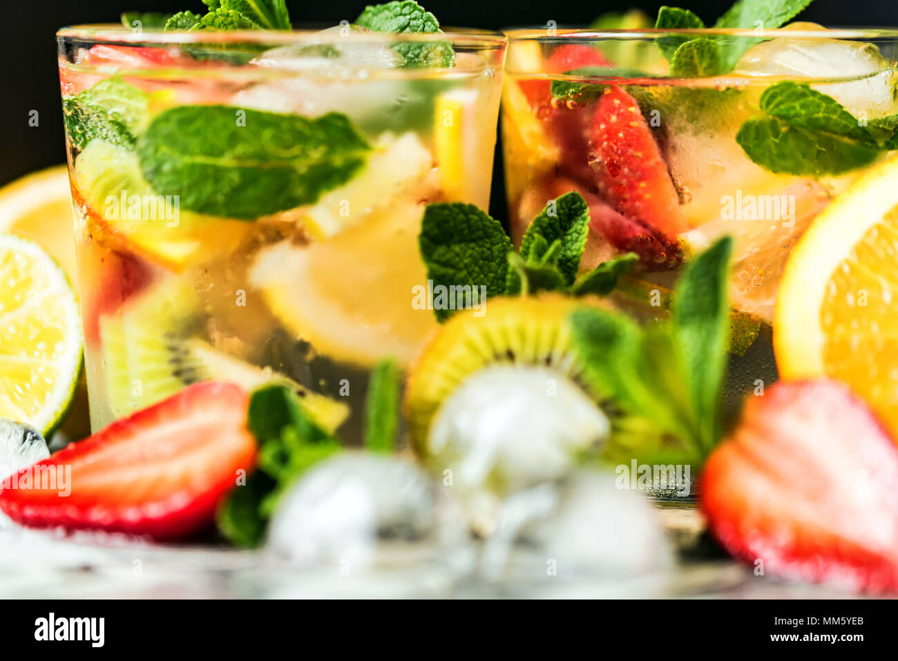 Homemade lemonade with fruit and mint Stock Photo - Alamy