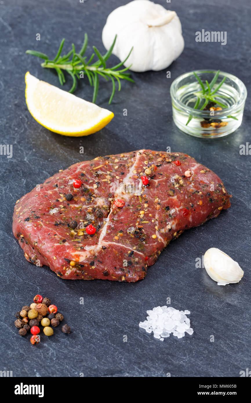 Meat raw beef steak portrait format on slate top view Stock Photo - Alamy