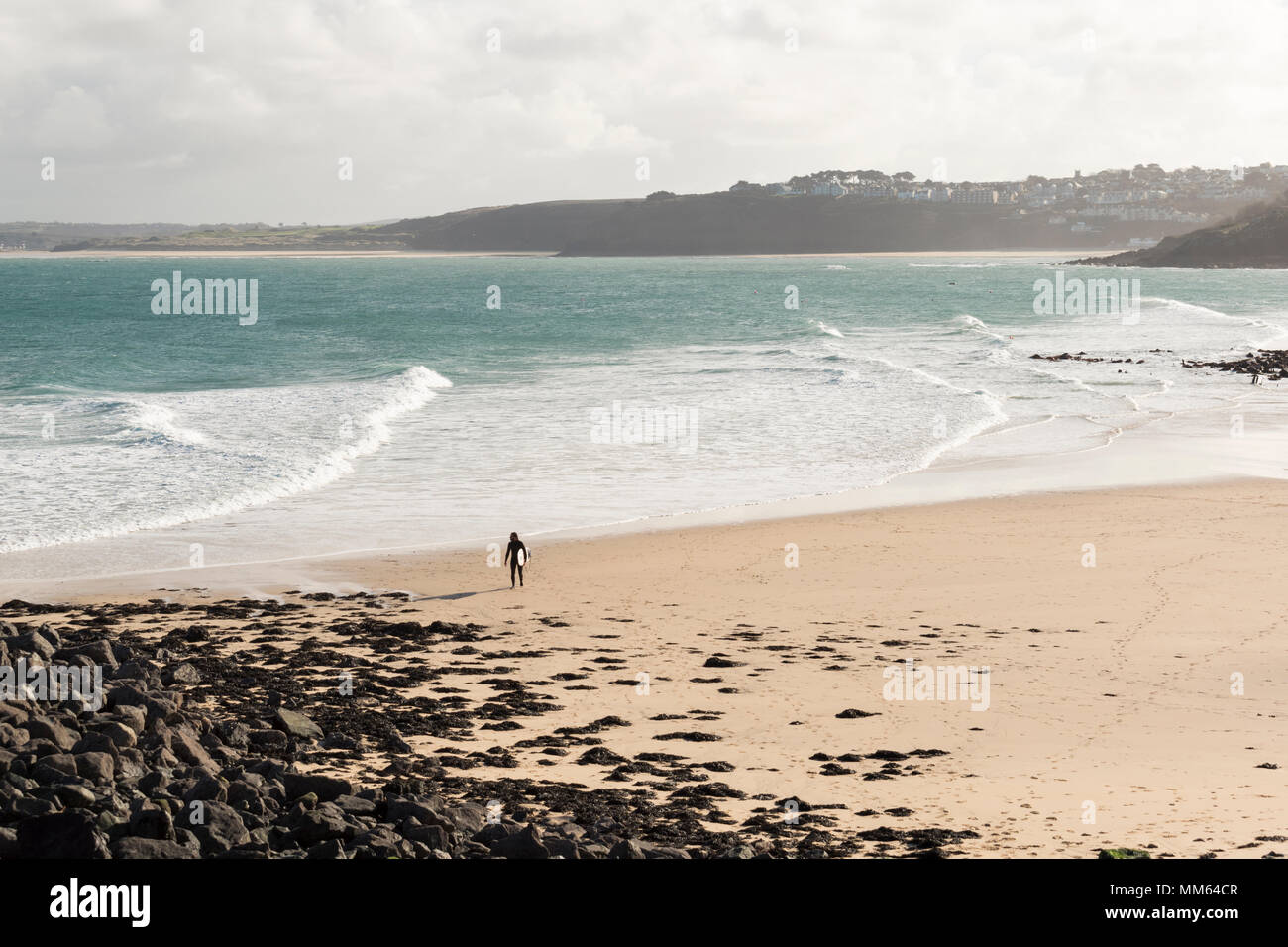 Man surfing, St Ives, Cornwall in Winter Stock Photo - Alamy