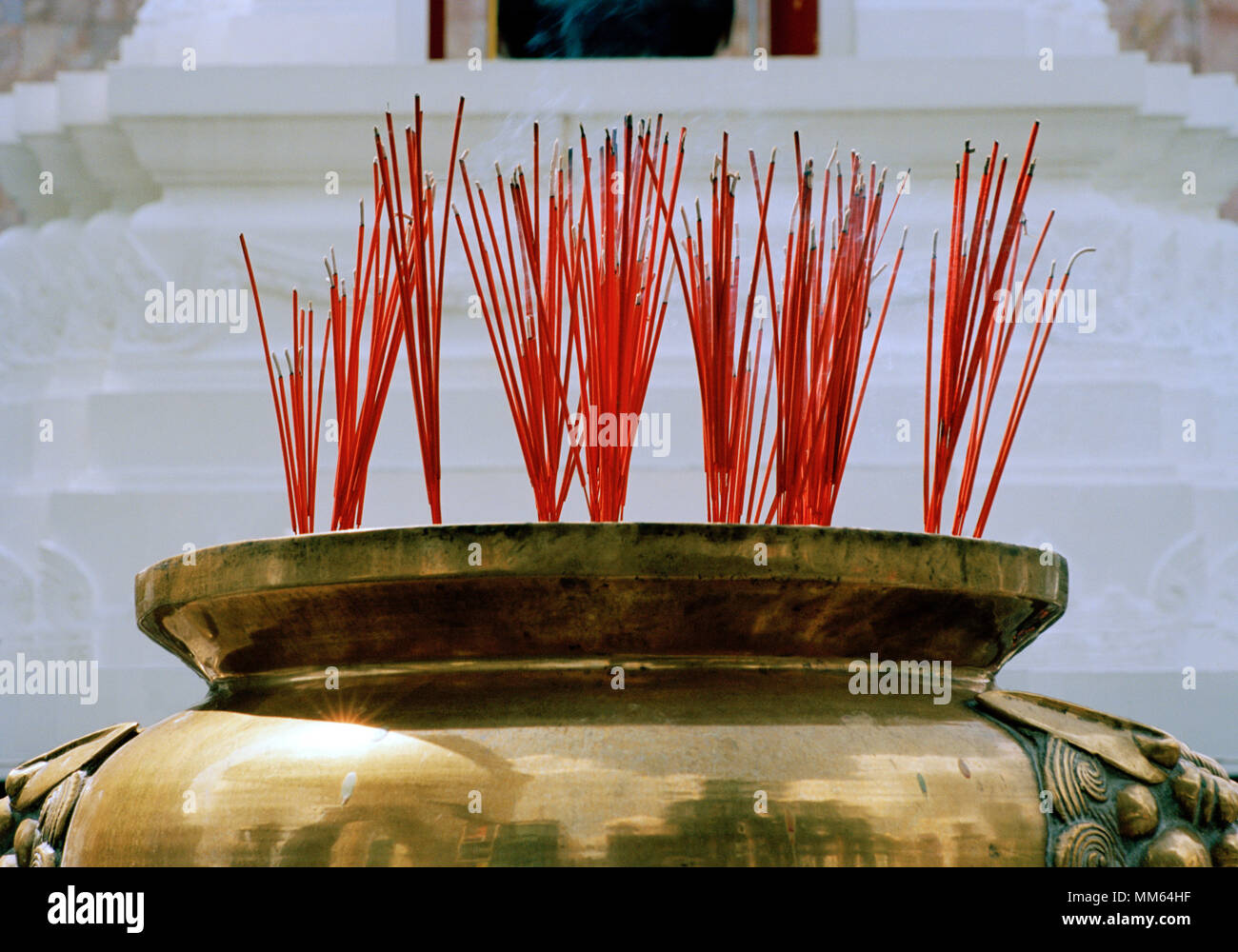 Incense sticks at the Trimurti statue God of Love at Central World in ...