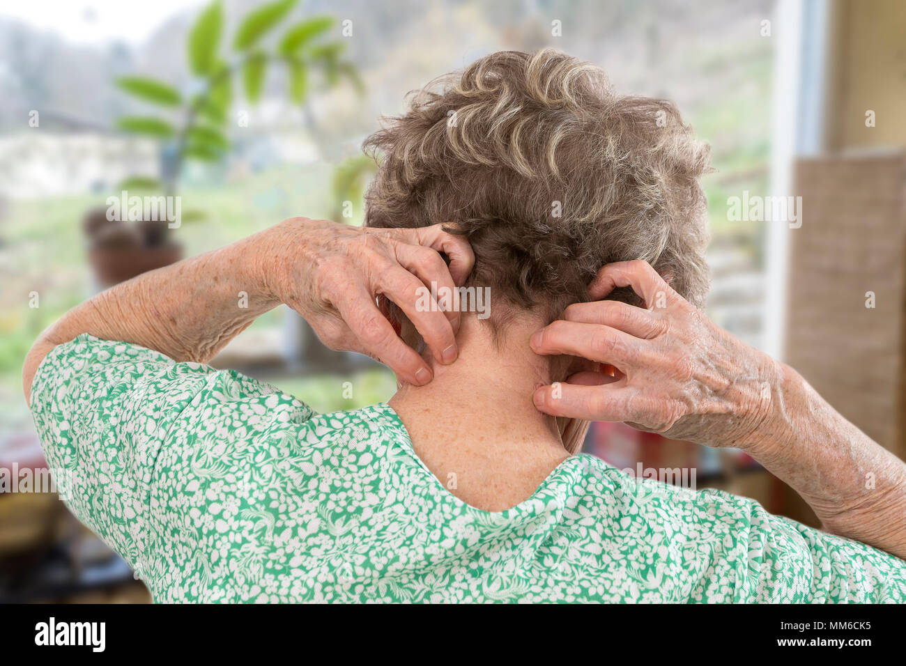 Itching elderly person hi-res stock photography and images - Alamy