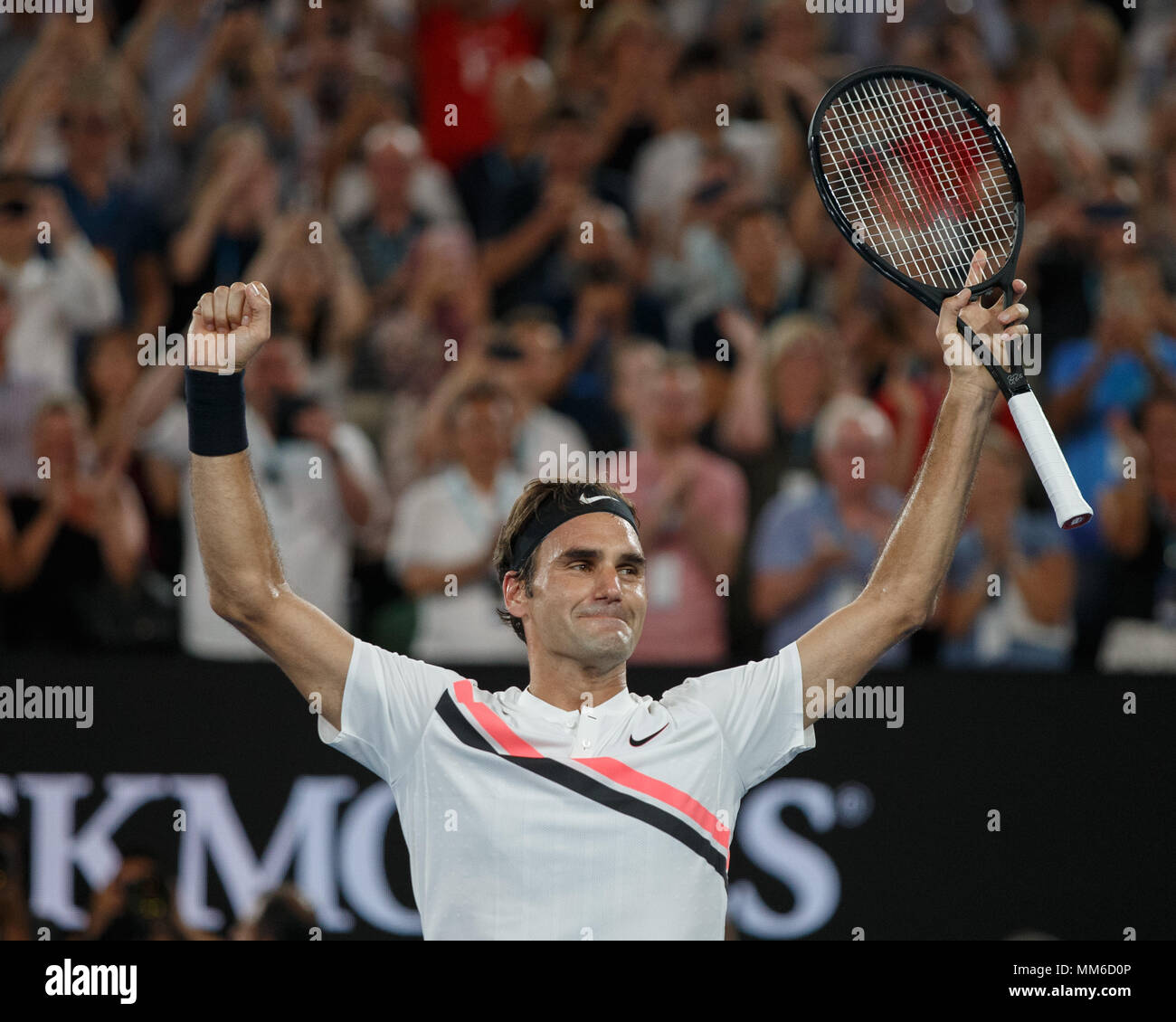 Professional sportsperson holding tennis racquet competition arms up hi ...