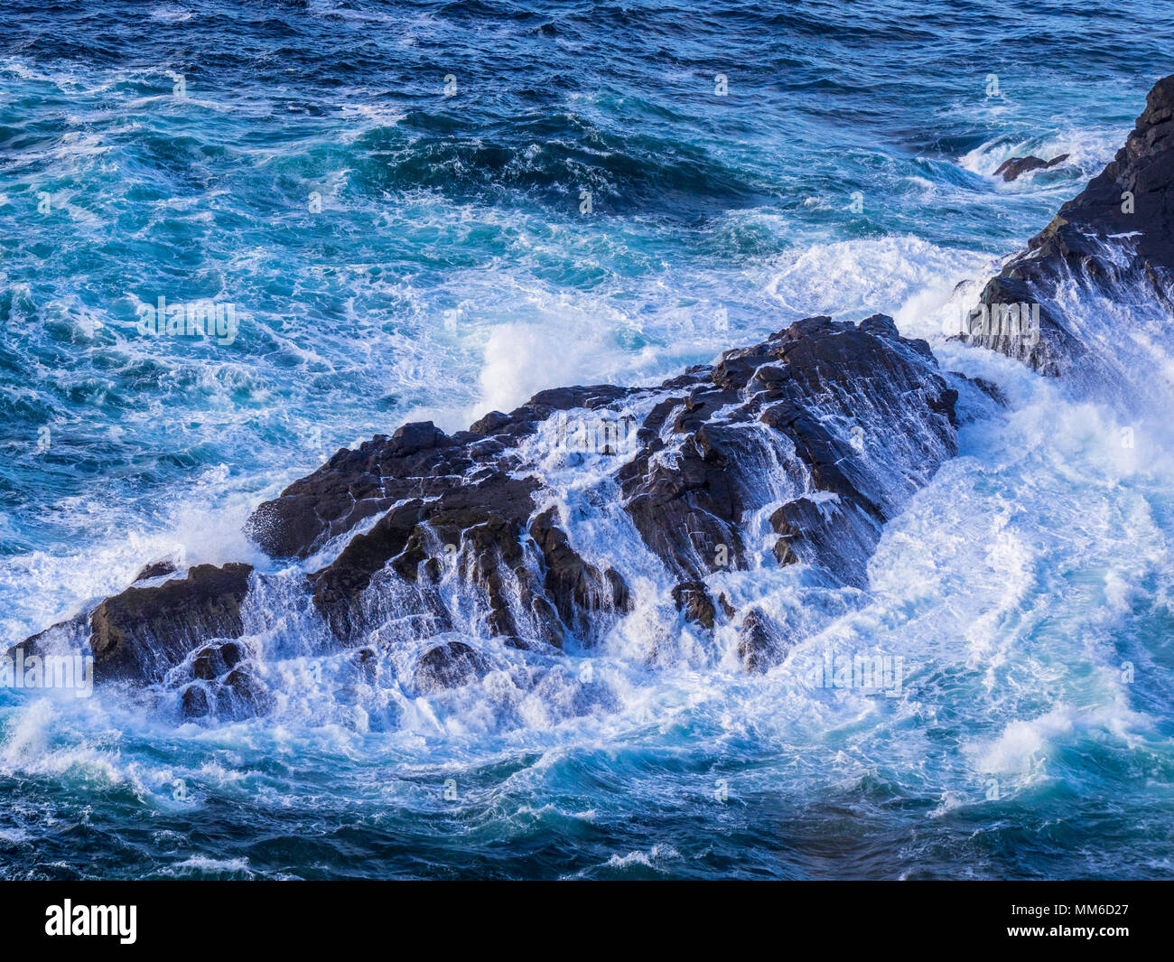 Wild Ocean Water hitting the rocks - blue Atlantic Stock Photo - Alamy