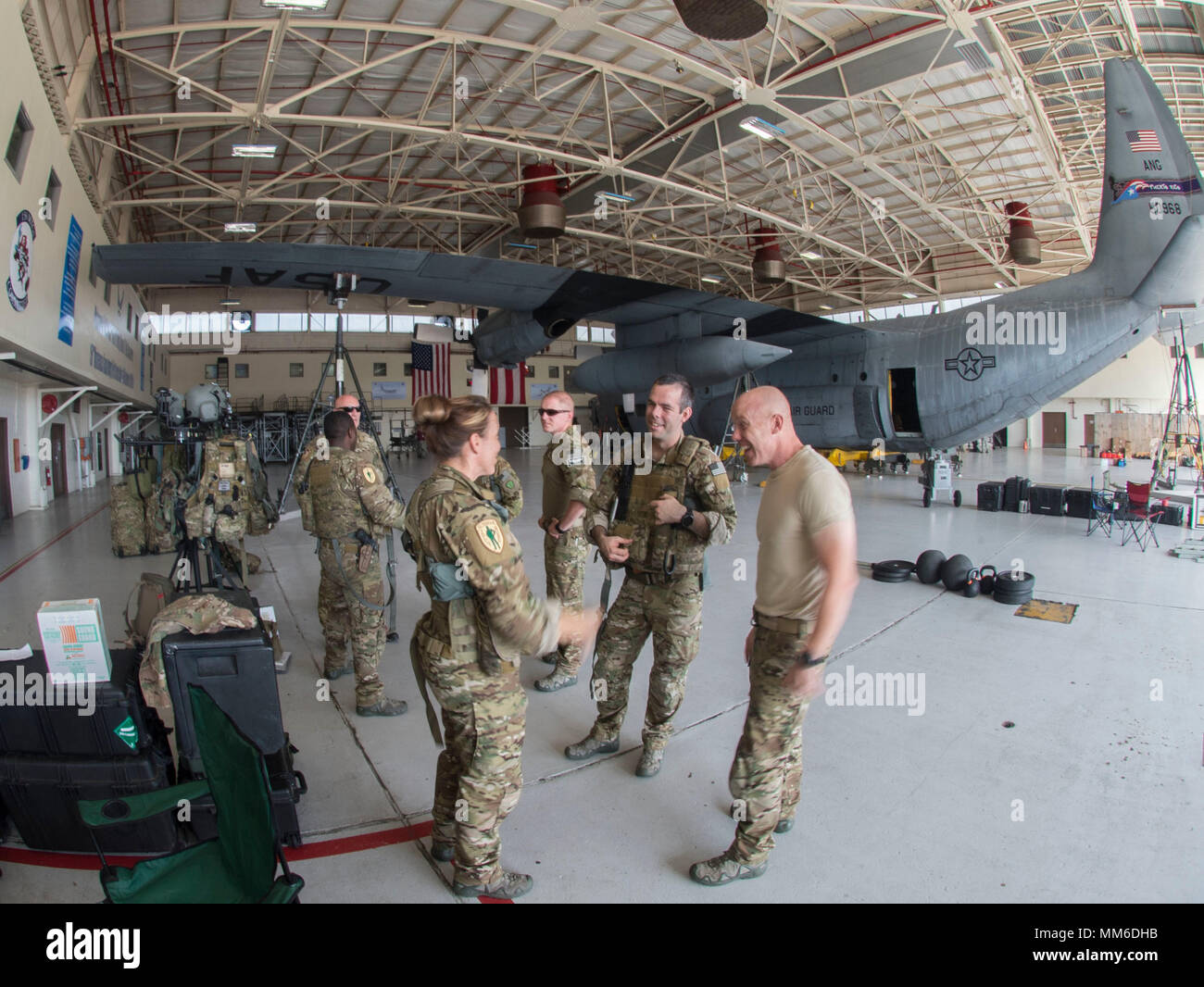 Crew members from the 101st and 103rd Rescue Squadrons prepare for ...