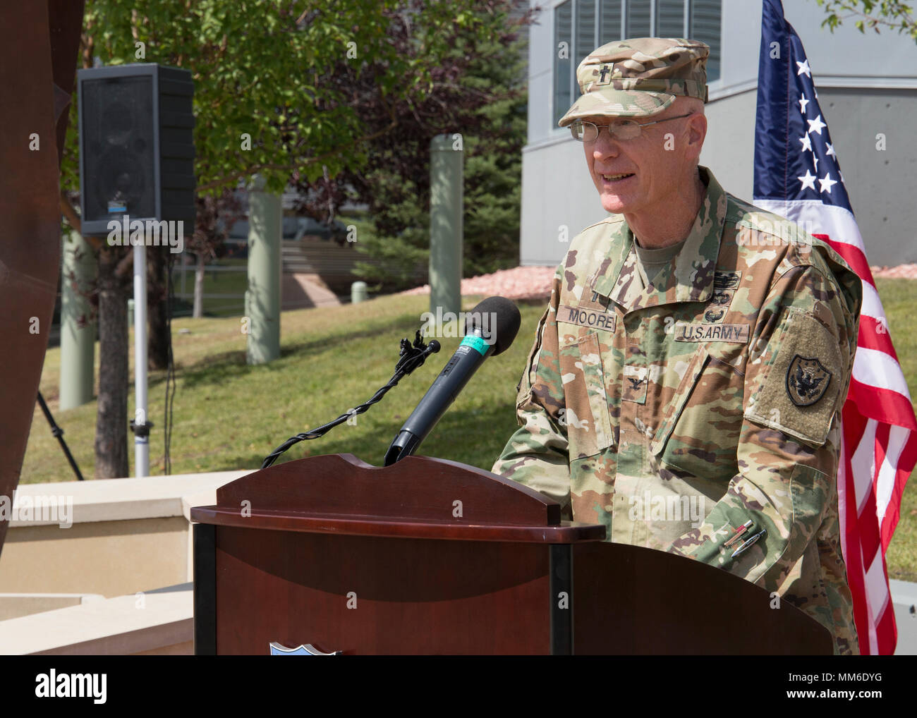 U.S. Army Chaplain (Col.) Kelly Moore offers the invocation at the ...