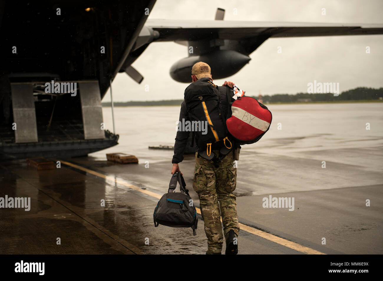 A California Air National Guard member with the 129th Rescue Wing ...