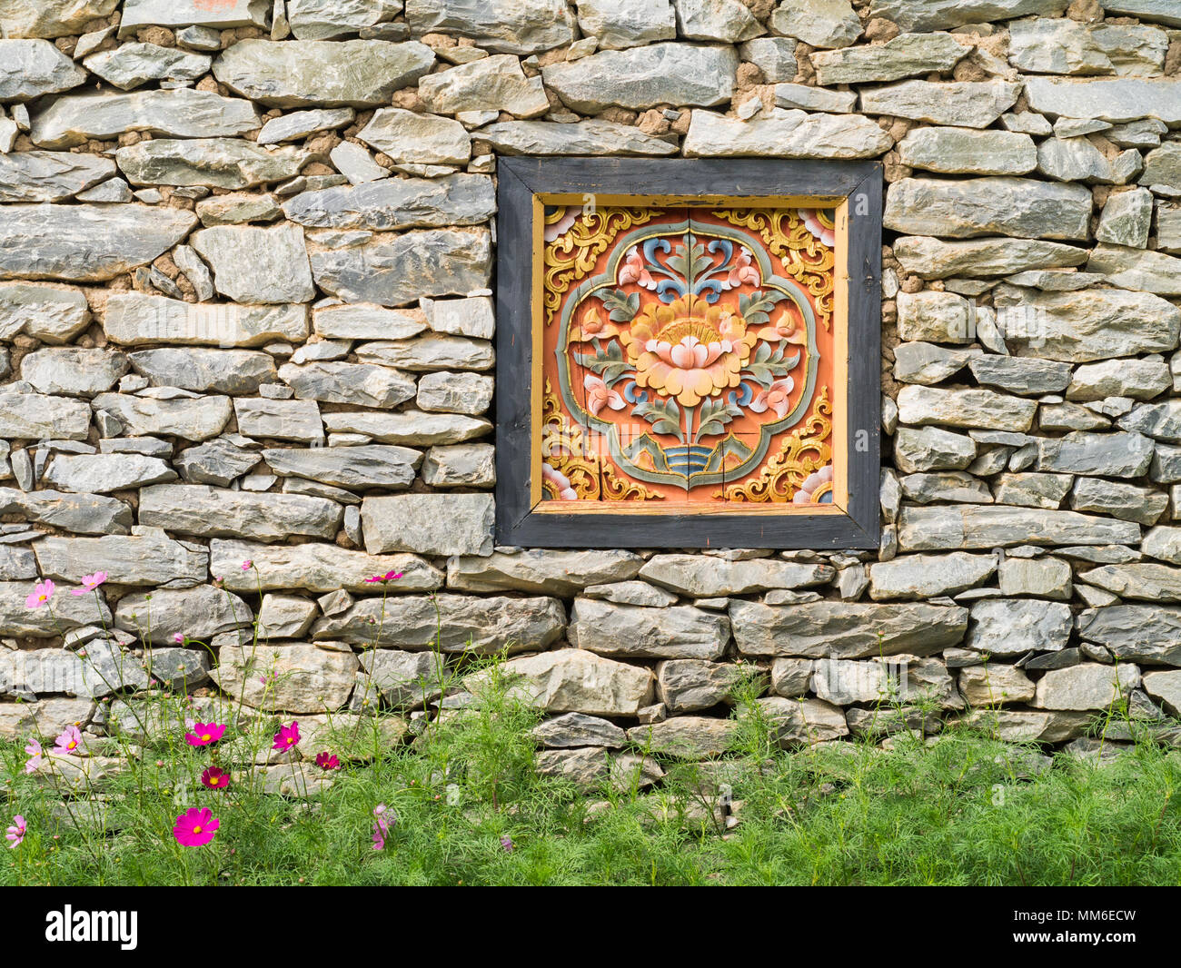 Bhutan wall style Stock Photo - Alamy