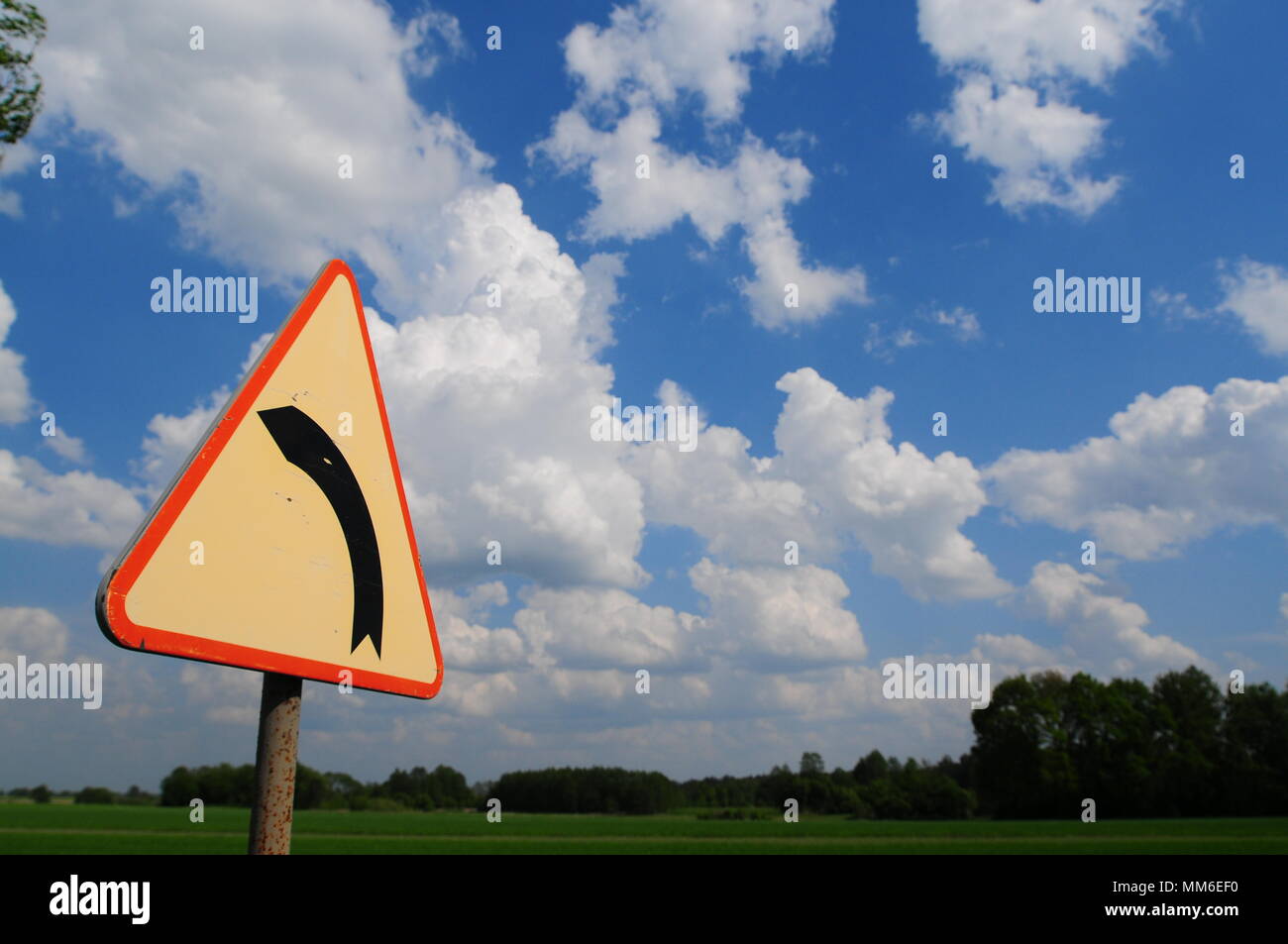 Road sign warning bend ahead hi-res stock photography and images - Alamy