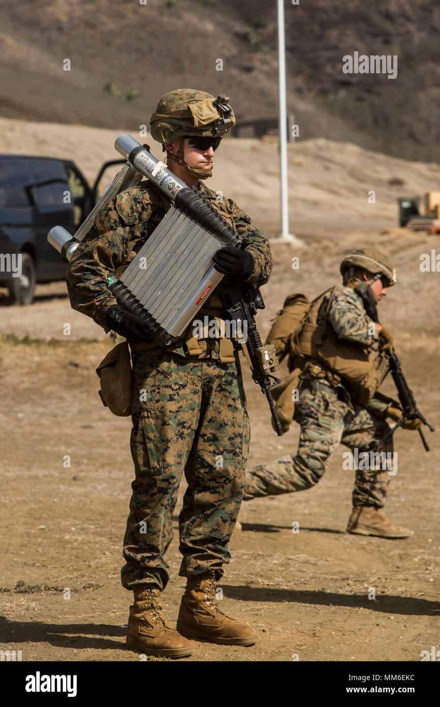 An assaultman with Echo Company, 2nd Battalion, 3rd Marine Regiment ...