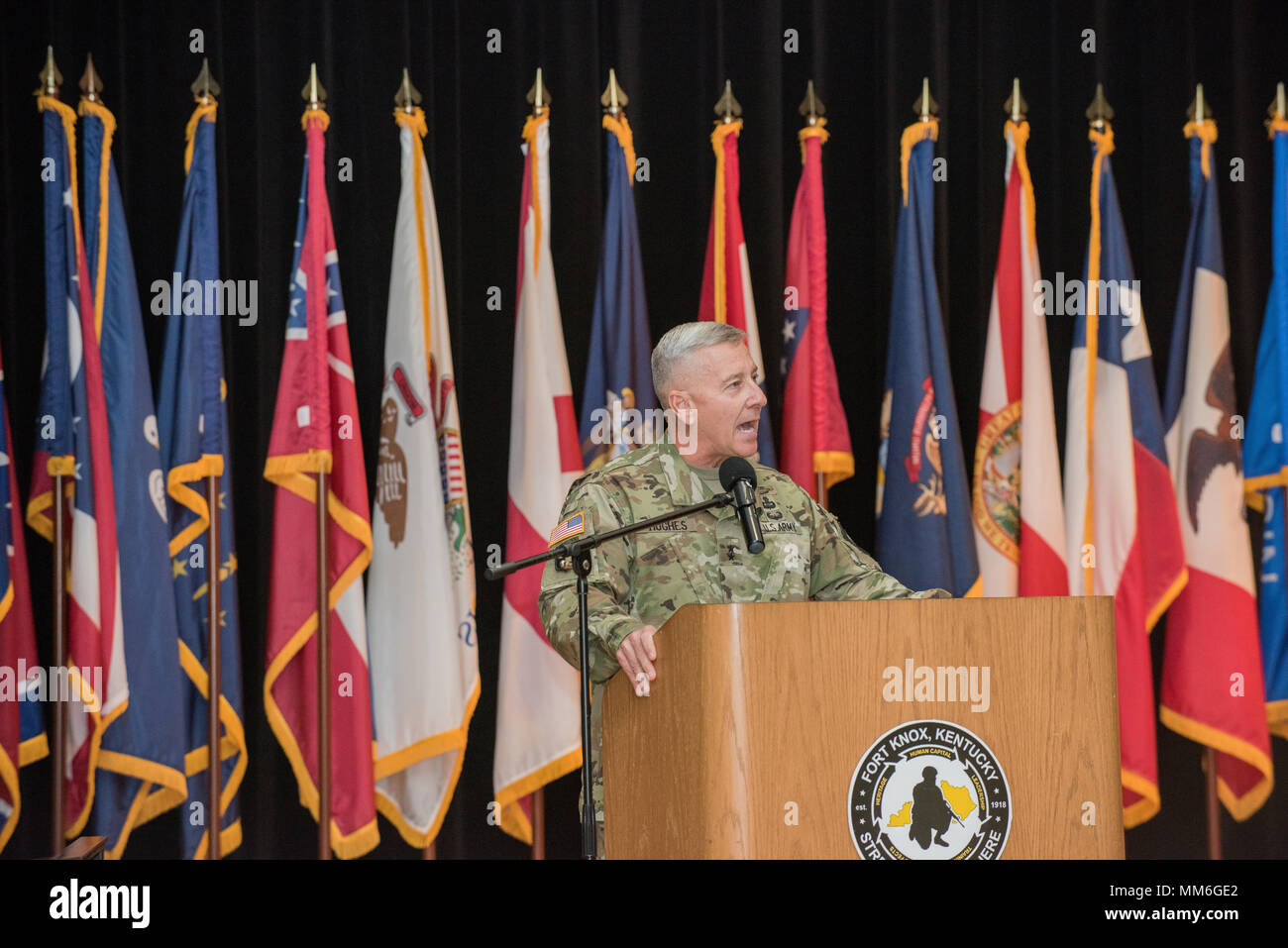Major General Christopher Hughes addresses the audience during the ...