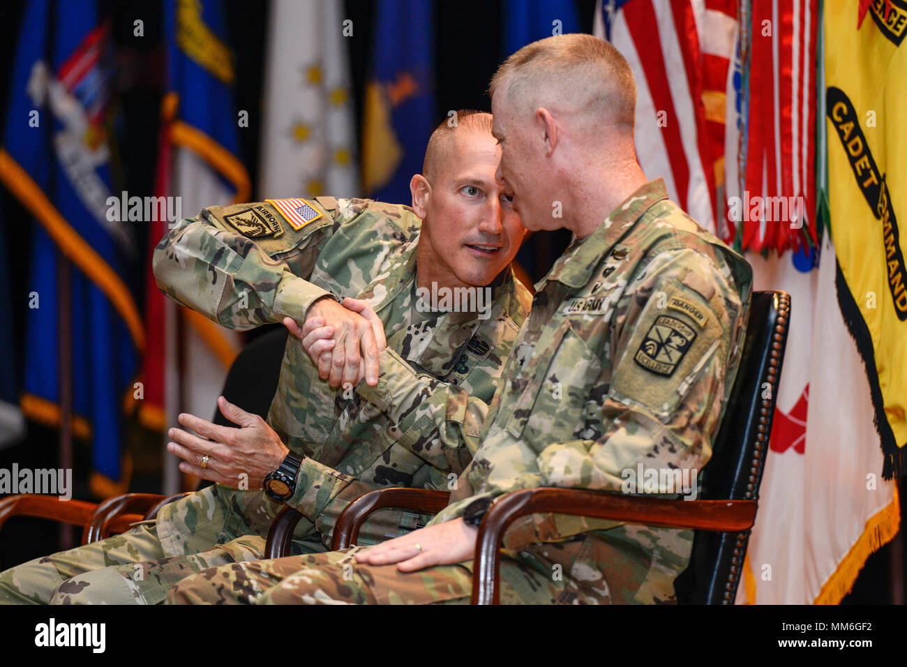 BG Robert Bennett congratulates incoming DCG Patrick Frank during the ...