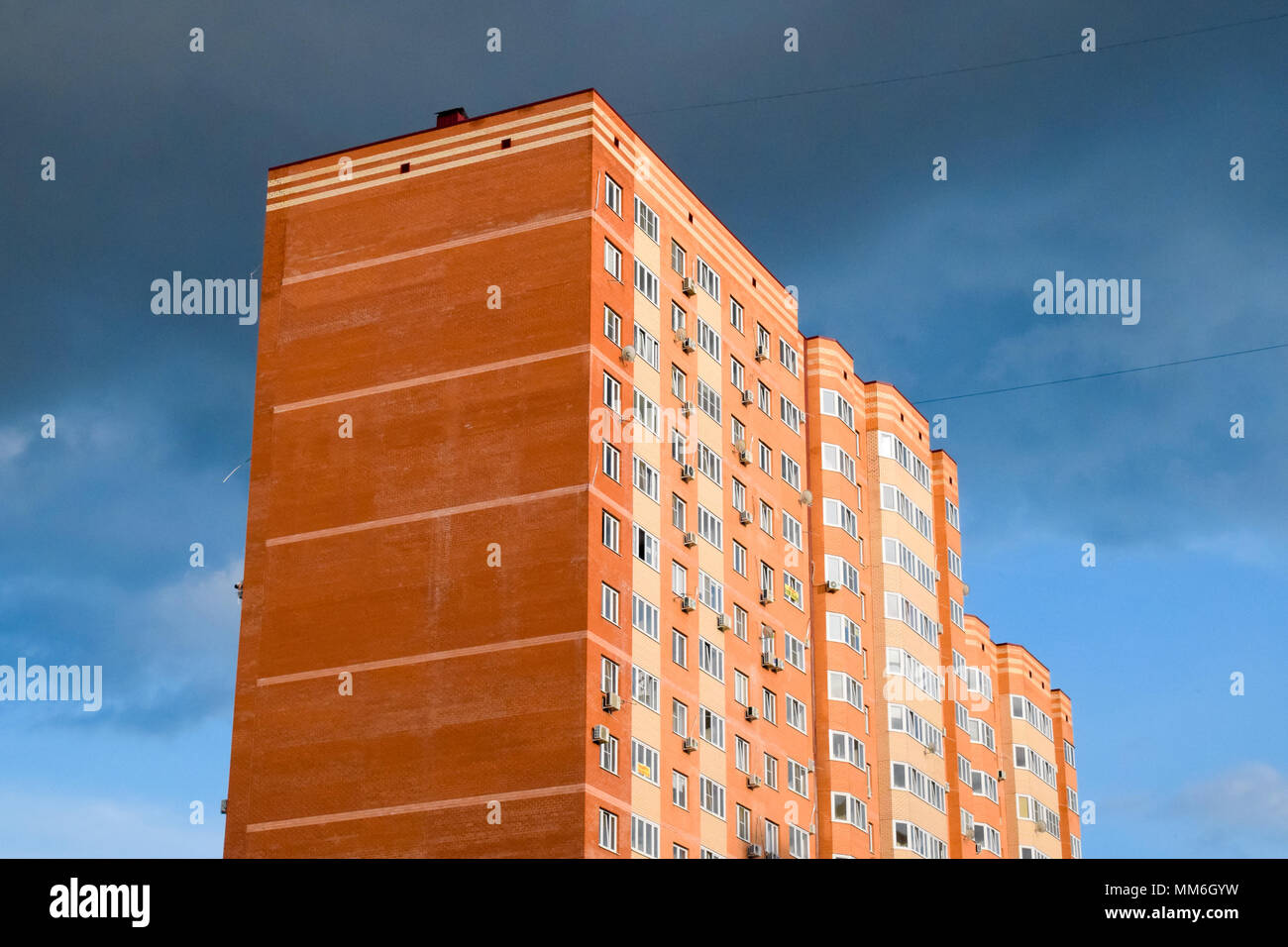 New storey residential building on the city street. Residential houses ...