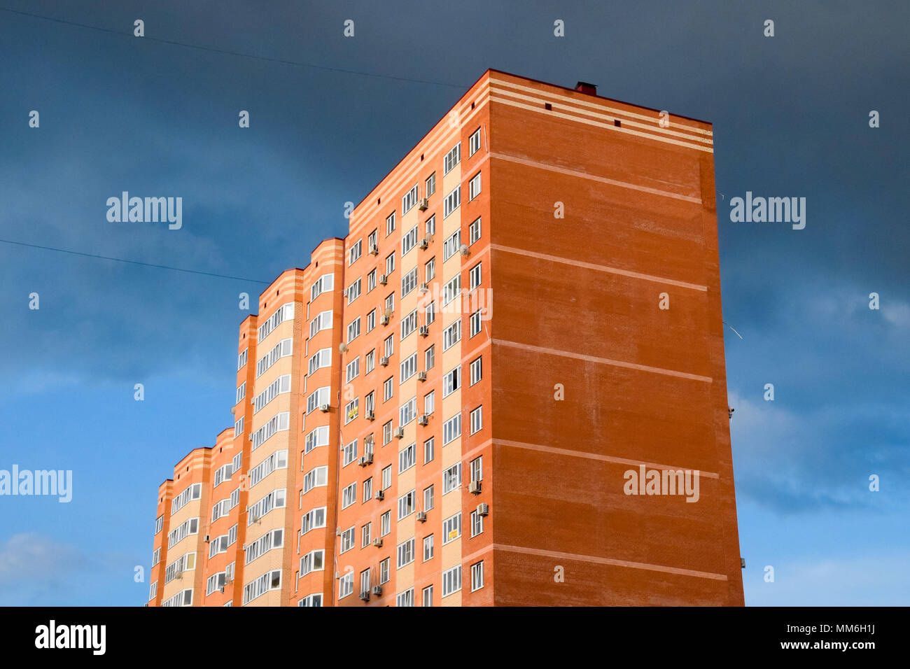 New storey residential building on the city street. Residential houses ...