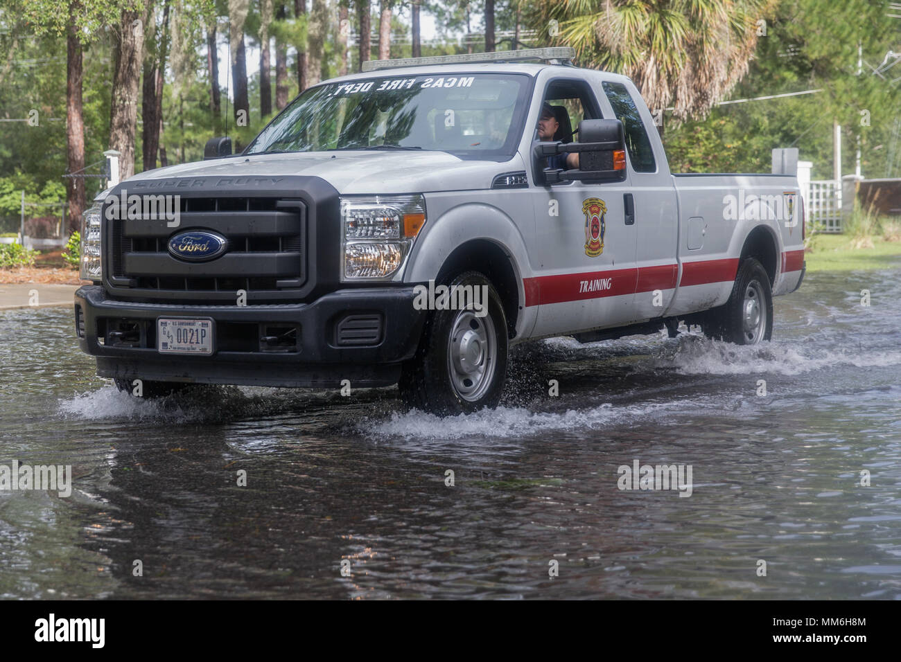 Marine Corps Air Station Fire Department (MCASFD) drives through ...