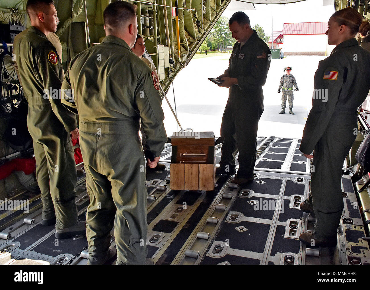 Major Ryan Nugent, aircraft commander, briefs the Rhode Island Air National Guard crew ...