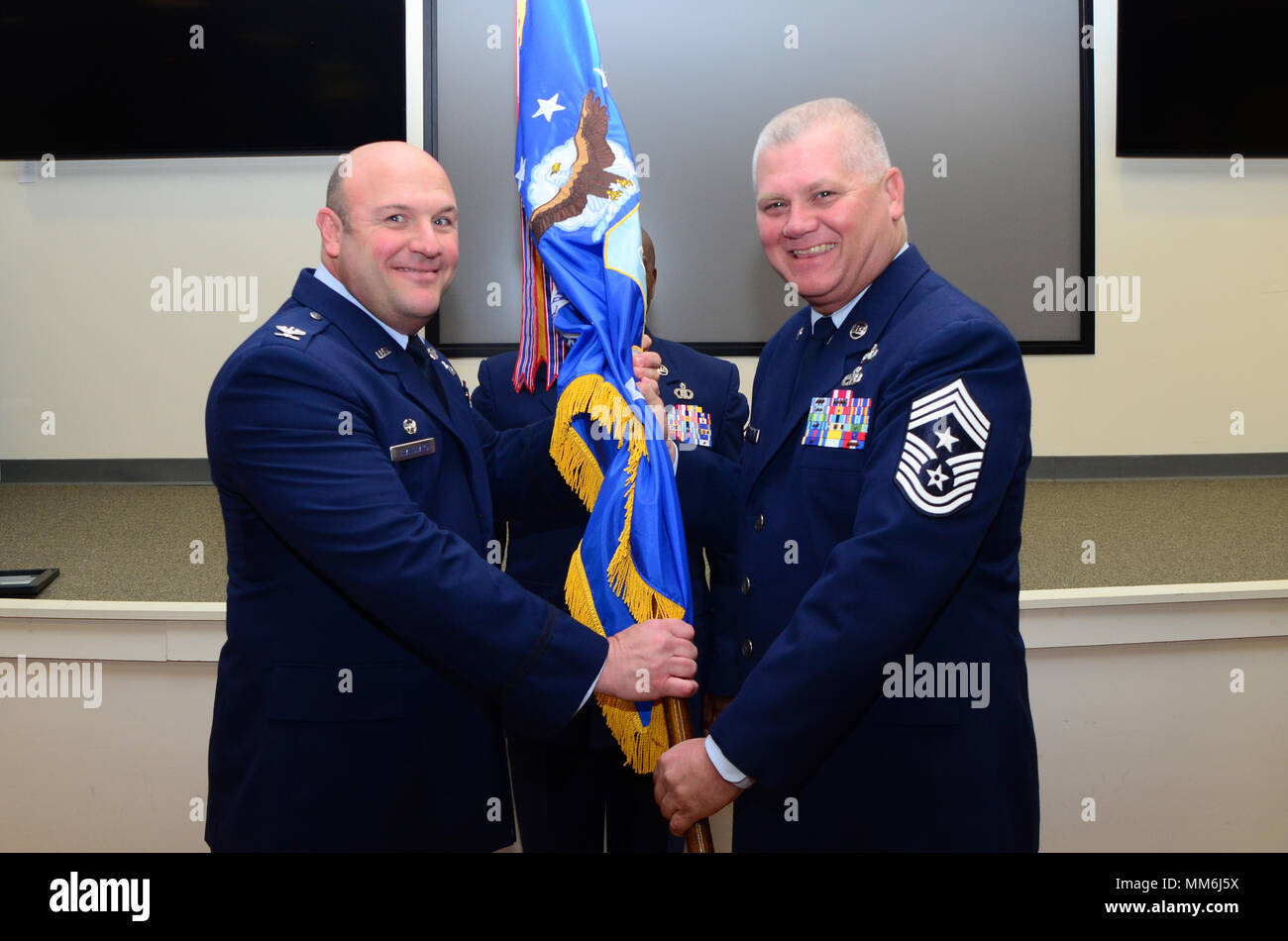The 172d Airlift Wing's CMSgt Scotty M. Cole accepts the Command Chief ...
