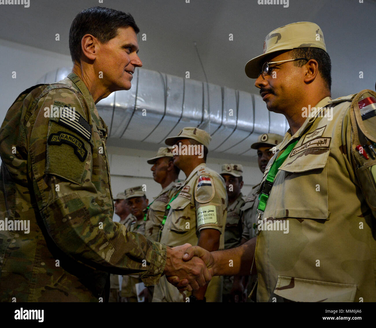 U.S. Army Gen. Joseph Votel, U.S. Central Command commander, shakes ...