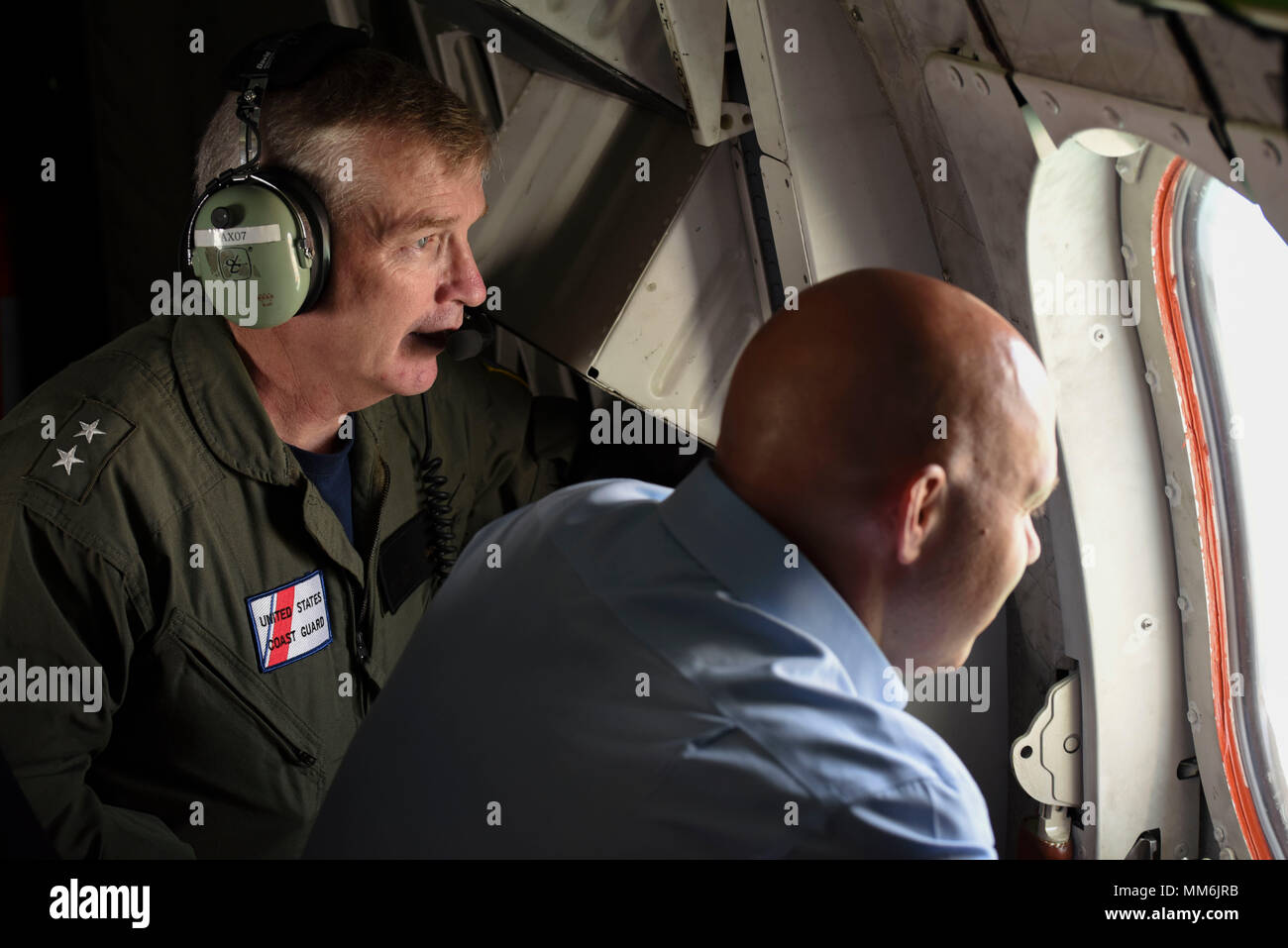 Coast Guard 7th District commander, Rear Adm. Peter Brown, looks out ...
