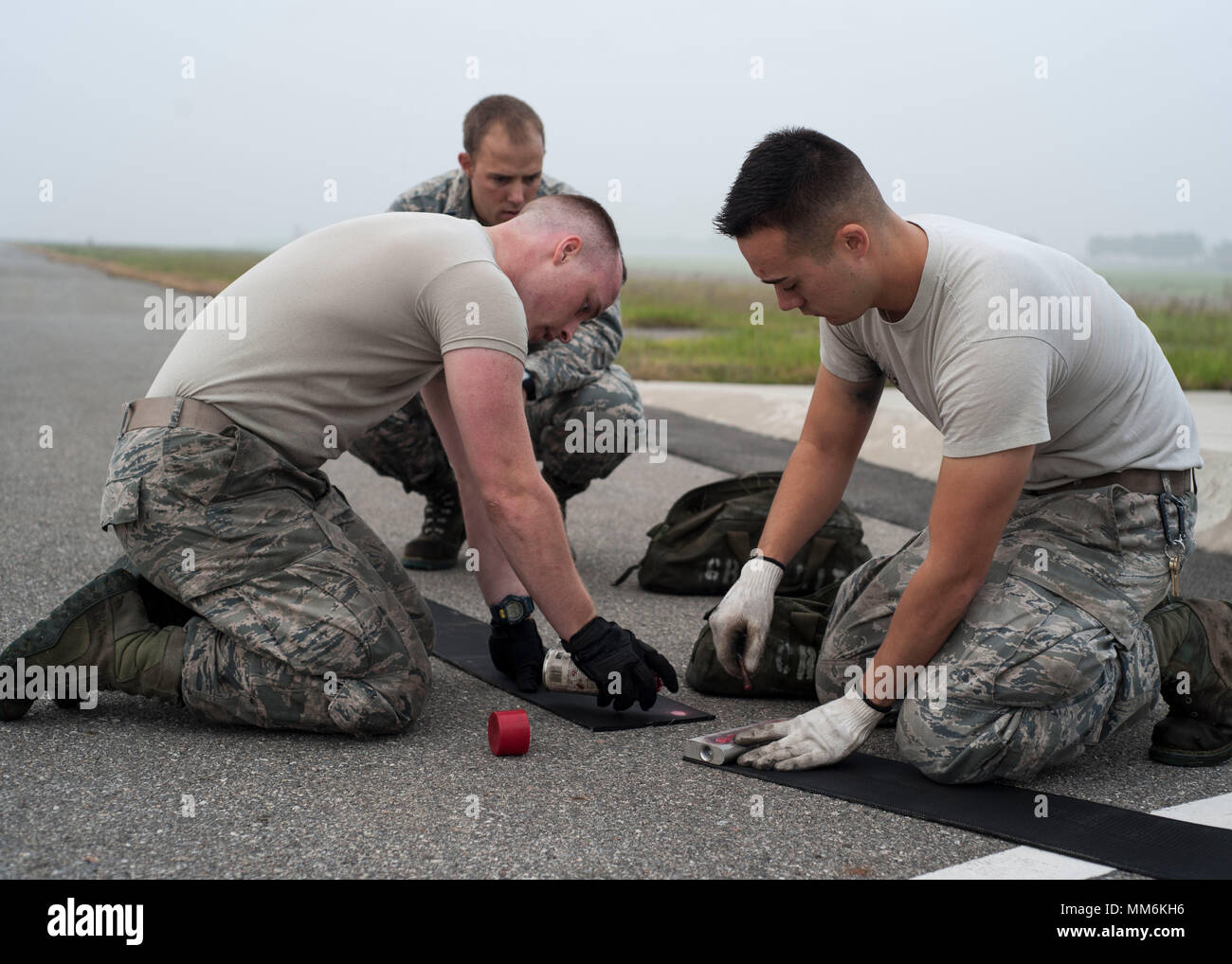 U.S. Air Force Airmen assigned to the 8th Civil Engineer Squadron ...