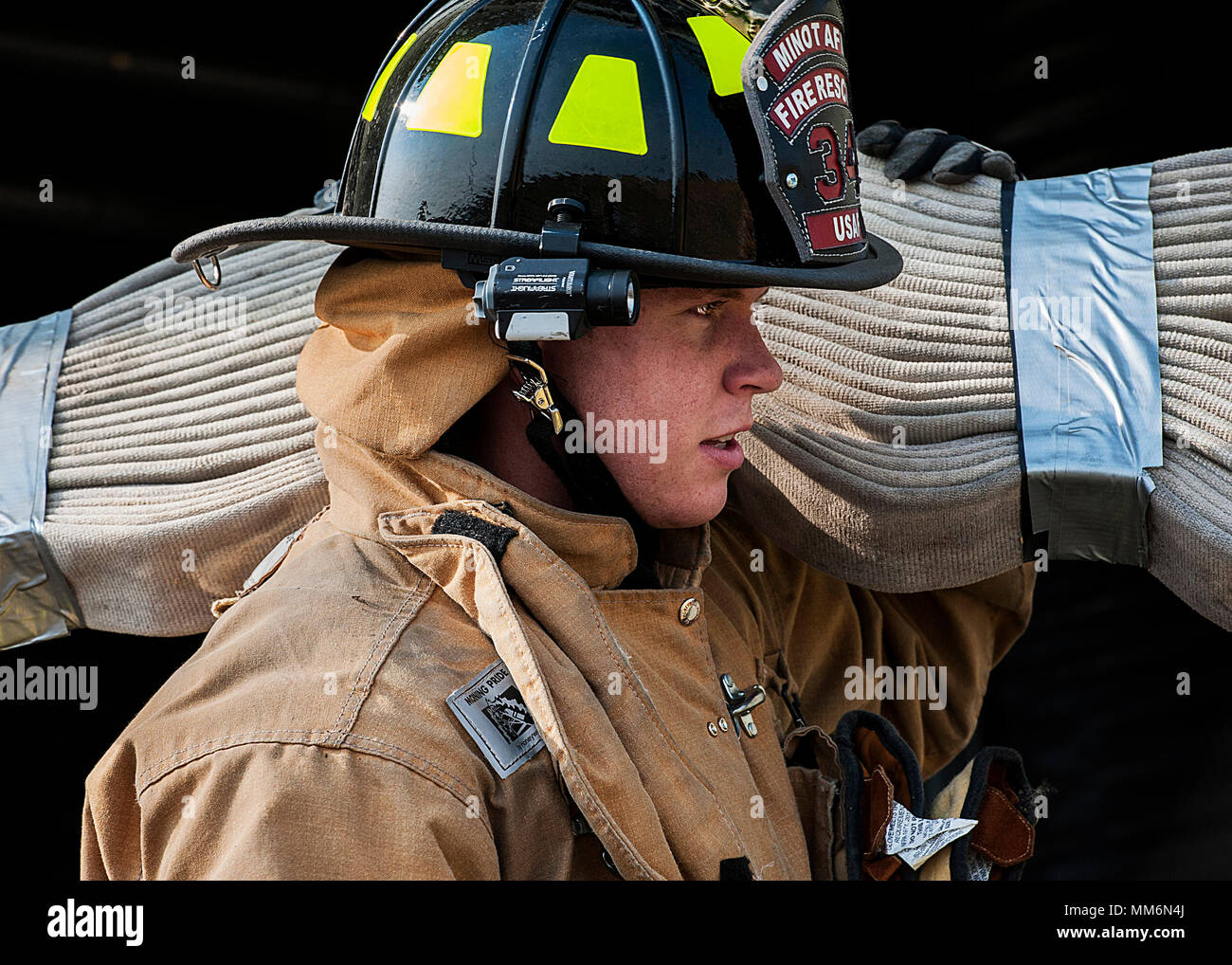 Carries firemen hi-res stock photography and images - Alamy