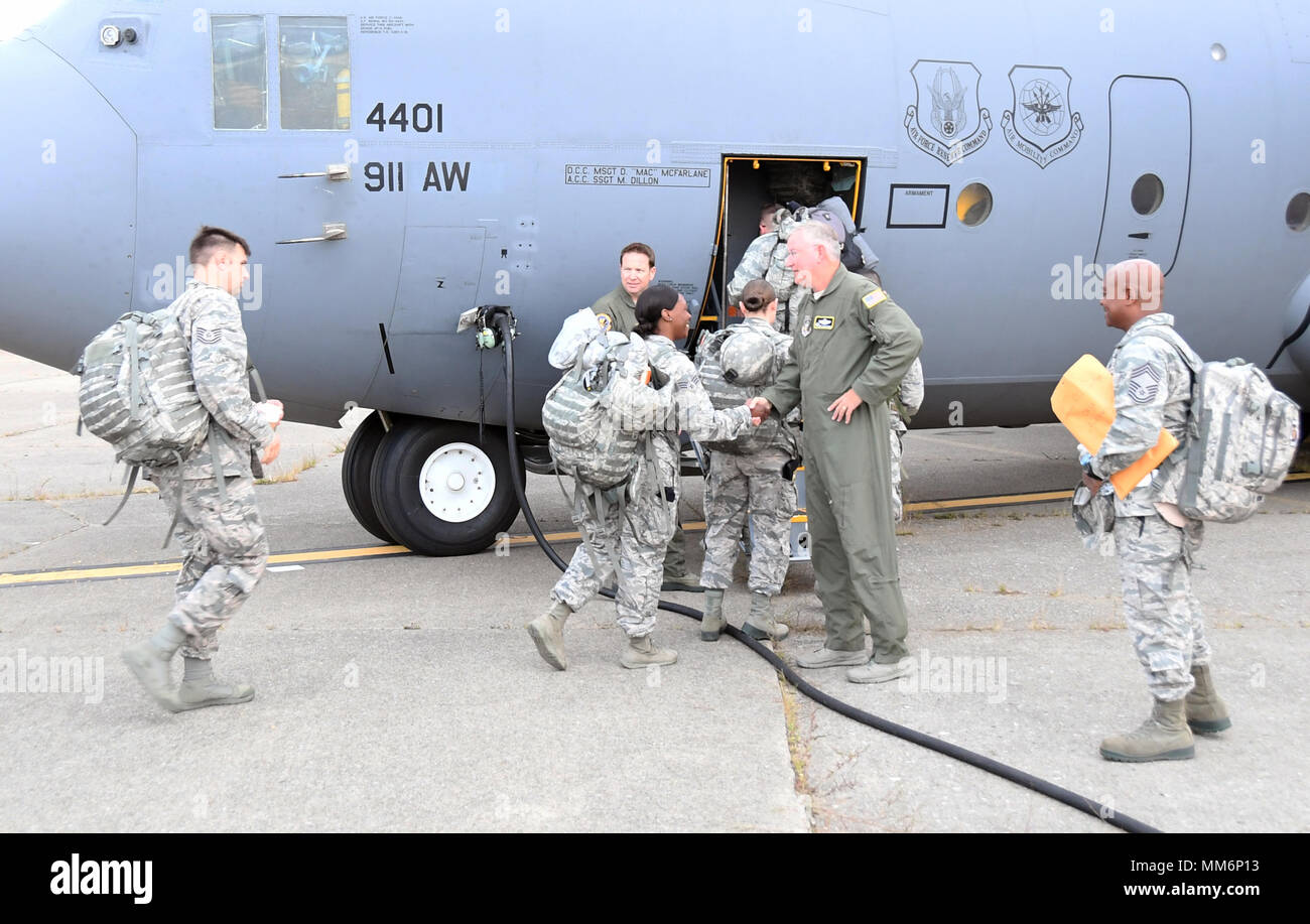 Col. Jeffrey A. VanDootingh, the 911th Airlift Wing commander, greets ...