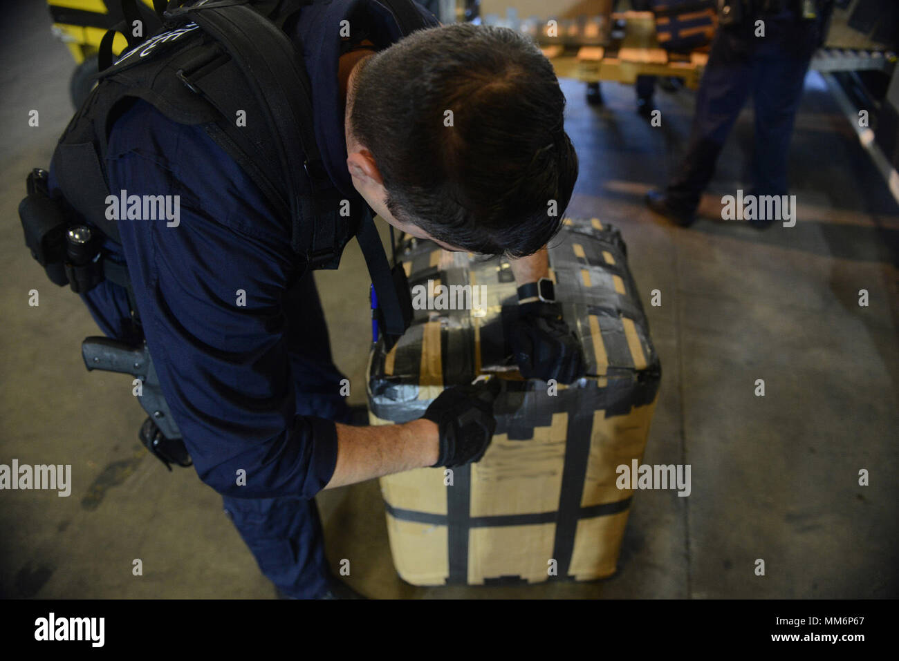 Petty Officer 3rd Class Kevin Friedlander, a sector boarding team ...