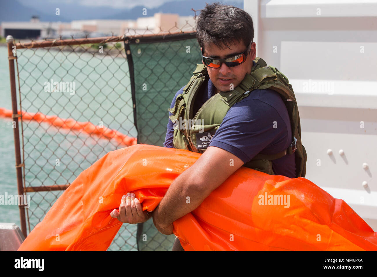 U.S. Navy Machinist’s Mate Third Class Jonathan Davis with Waterfront ...