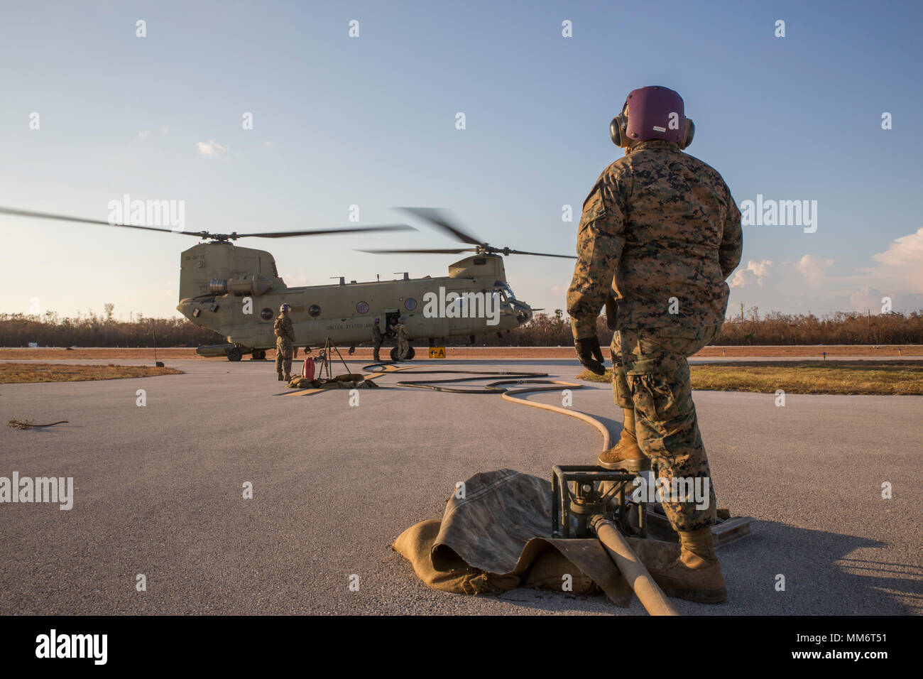 U.S. Marine Lance Cpl. Isaac Aquilar, a bulk fuel specialist with ...