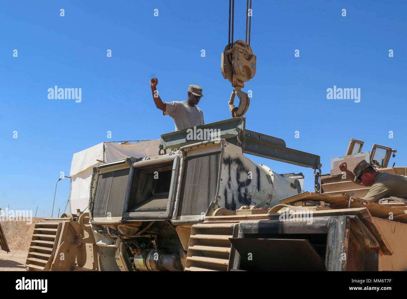 Spc. Greg Saint Jean and Spc. Kenneth Pope, both small arms and ...