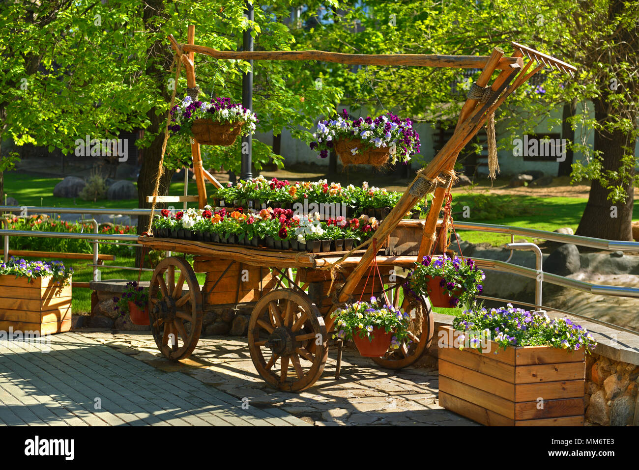 Rural cart with flowers Stock Photo - Alamy