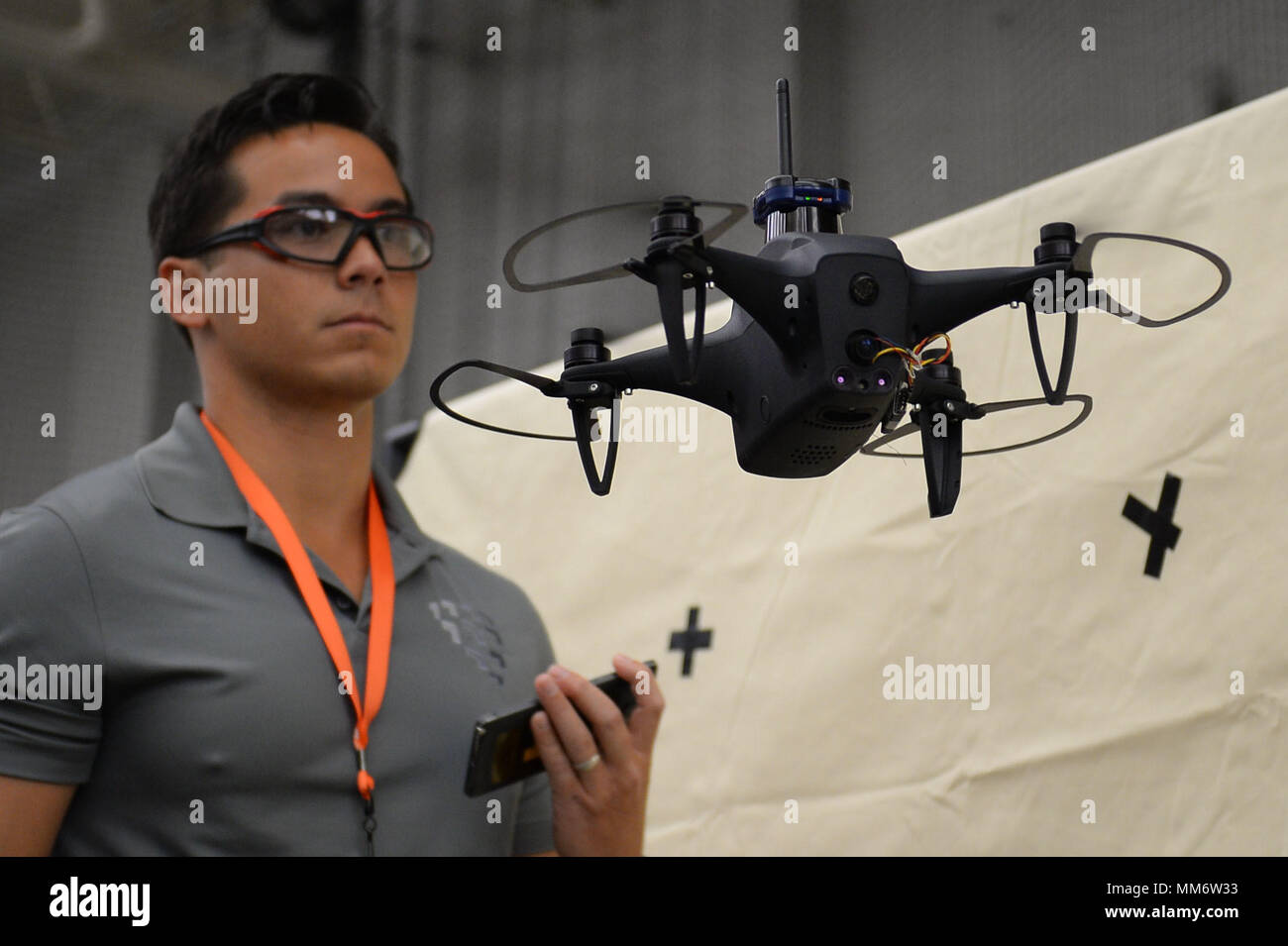 Brandon Tseng commands an autonomous drone during the ThunderDrone Tech ...