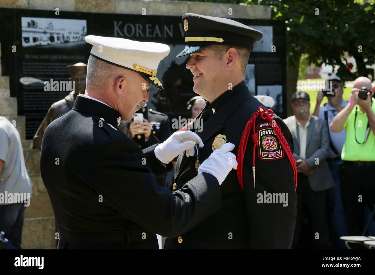 Retired Marine Staff Sgt. Eric Smith is awarded the Navy Cross by Maj ...