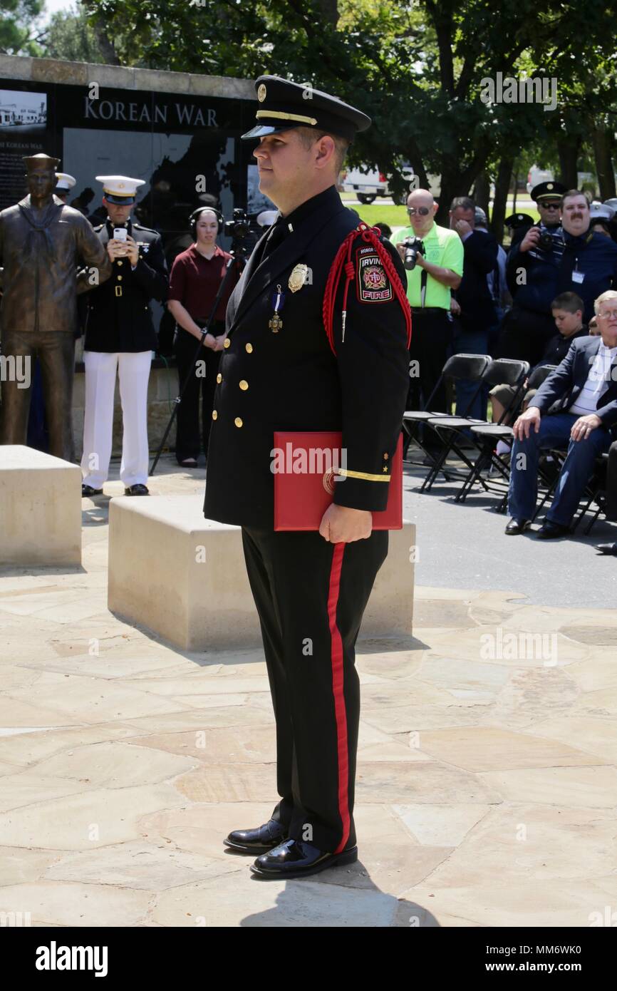 Retired Marine Staff Sgt. Eric Smith is awarded the Navy Cross by Maj ...