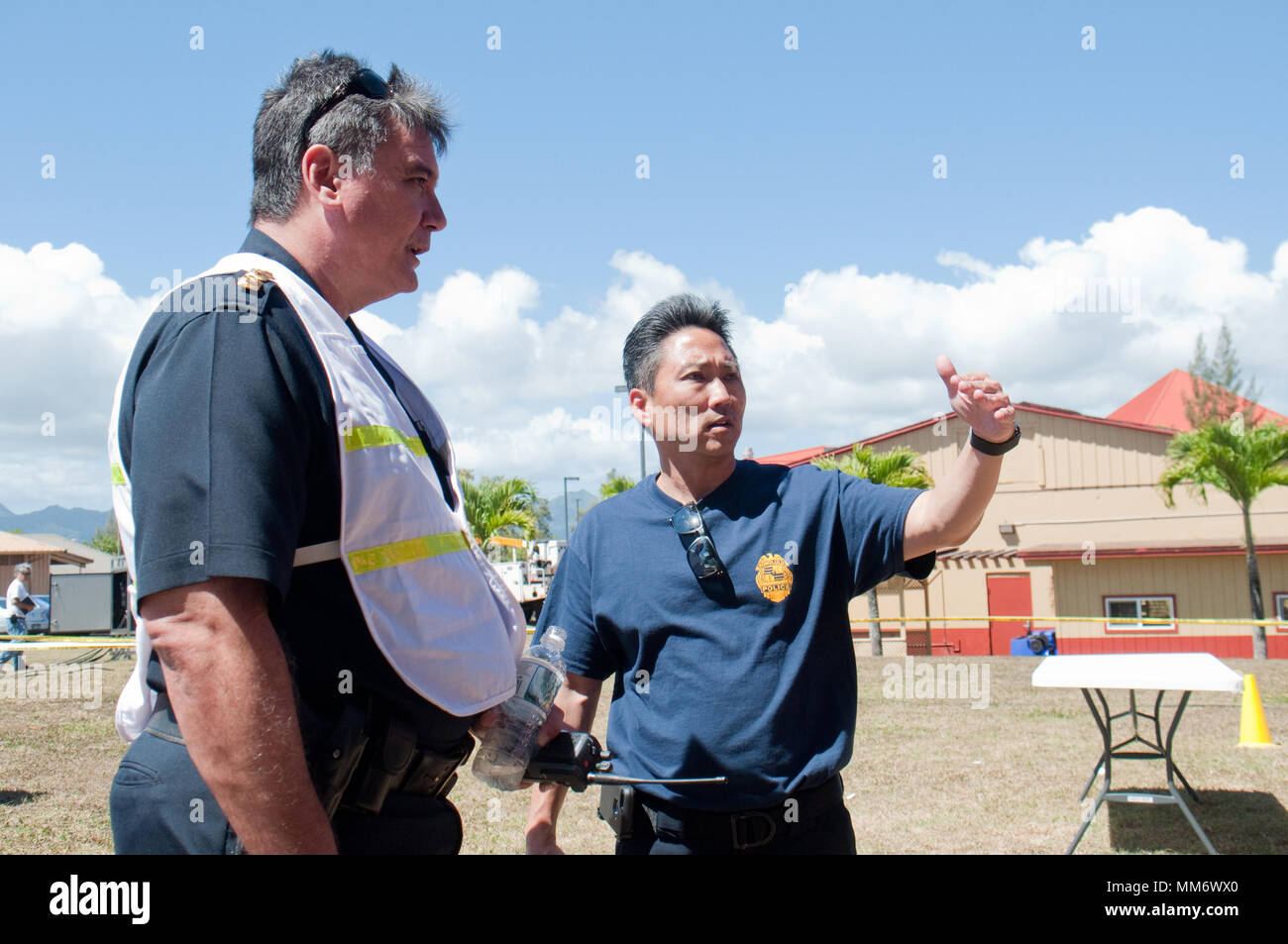 HELEMANO MILITARY RESERVATION — Police Capt. Glenn Hayashi (right), a ...