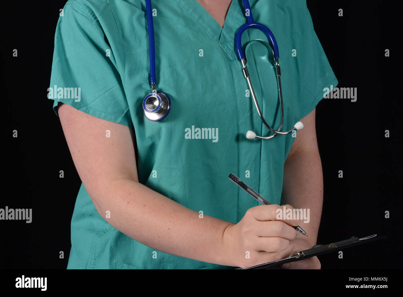 Doctor taking notes Stock Photo - Alamy