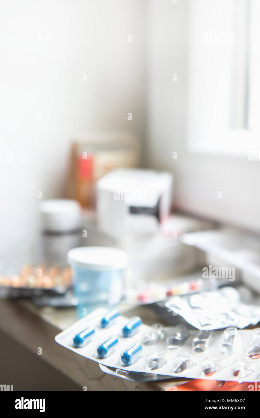 Close up of stacks of different pills in packets Stock Photo - Alamy