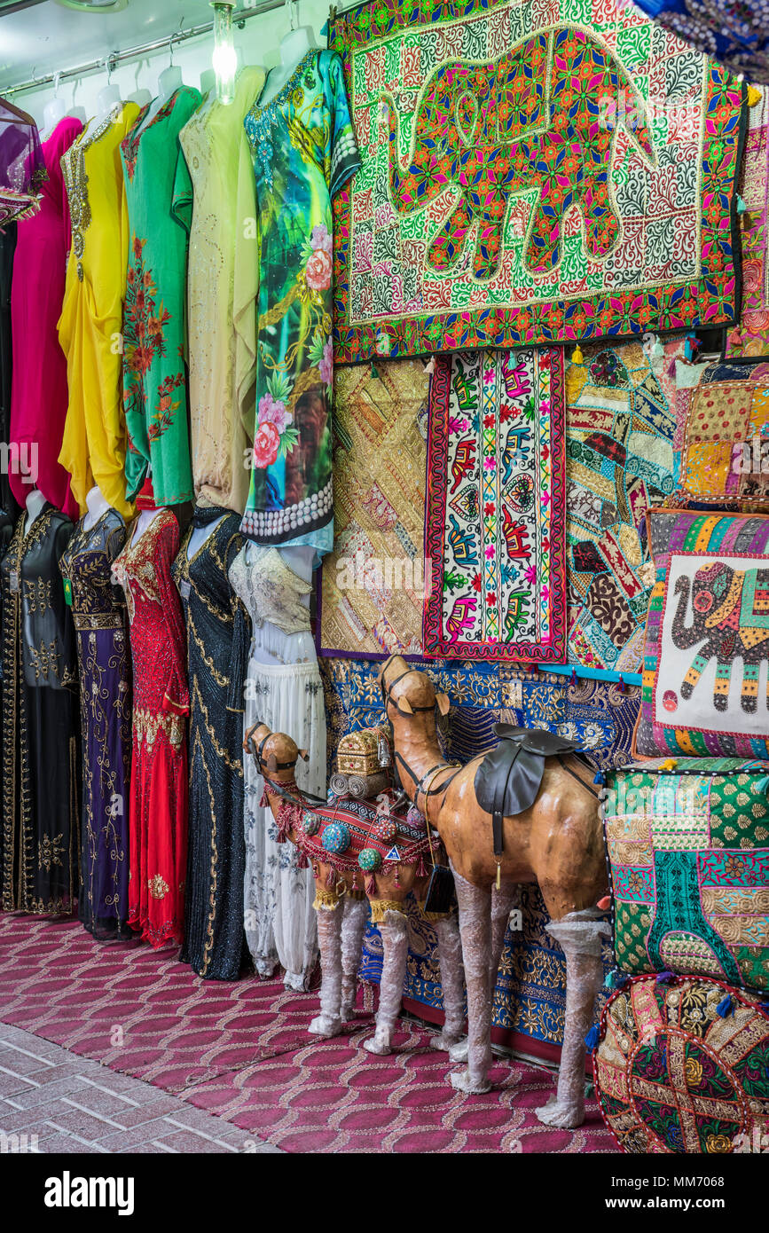 Clothes and textiles for sale in the textile markets of old town Duba ...