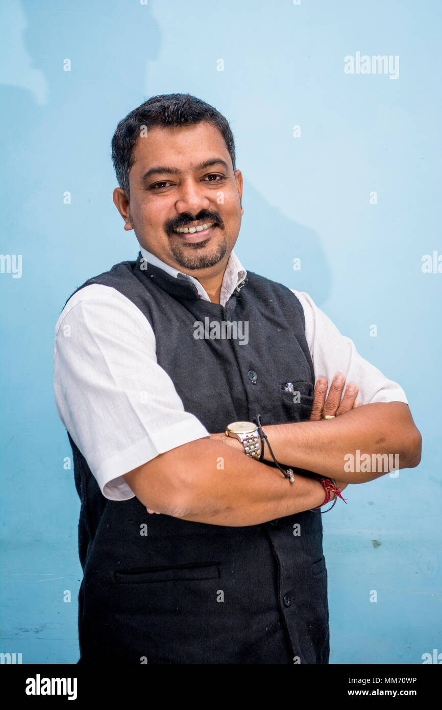 Indian man smiling Stock Photo - Alamy