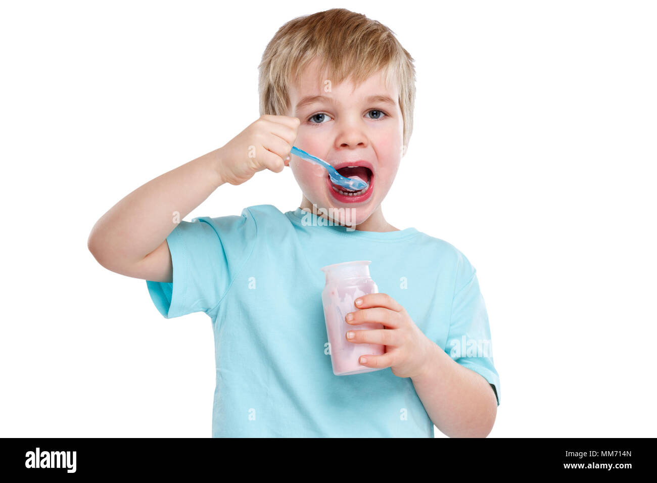 Child kid boy eating yogurt healthy isolated on a white background ...
