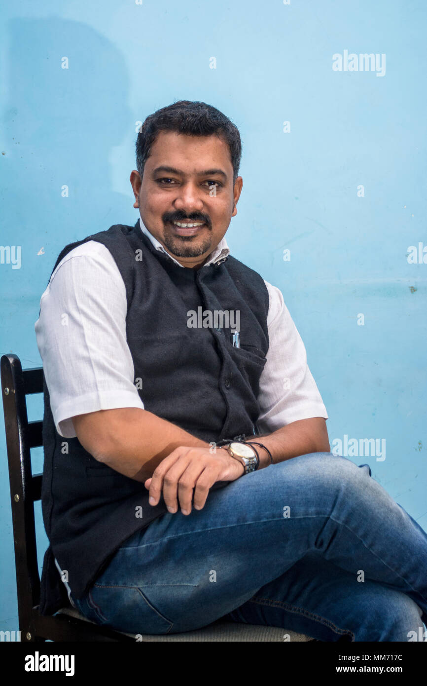 Indian man smiling Stock Photo - Alamy