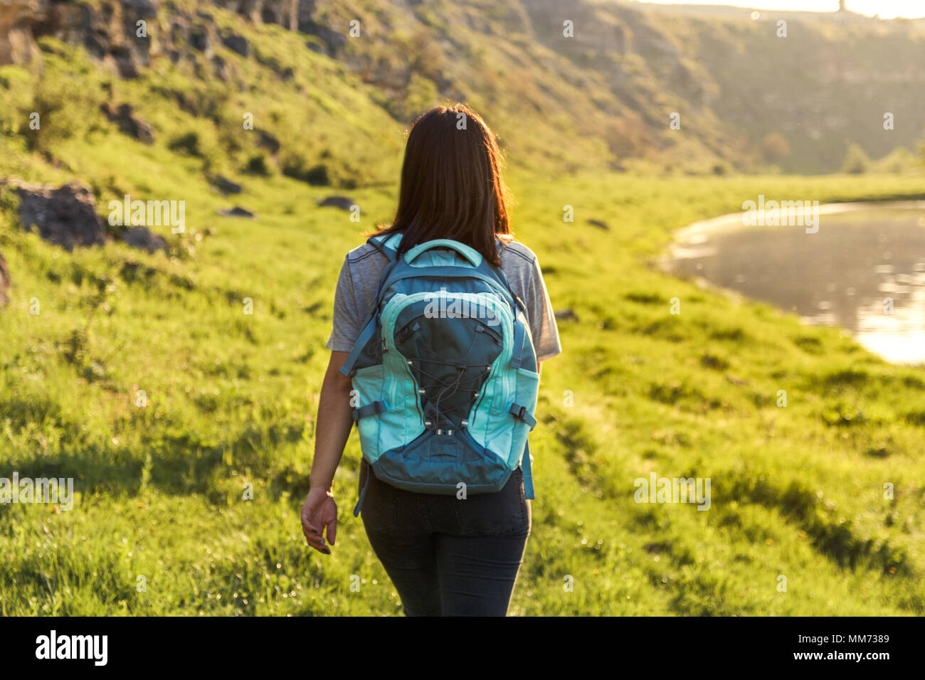 Traveler Woman with backpack looking landscape view at nature green ...