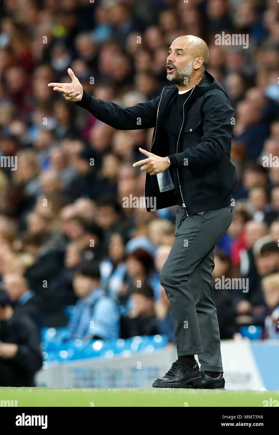 Manchester City manager Pep Guardiola gestures on the touchline during ...
