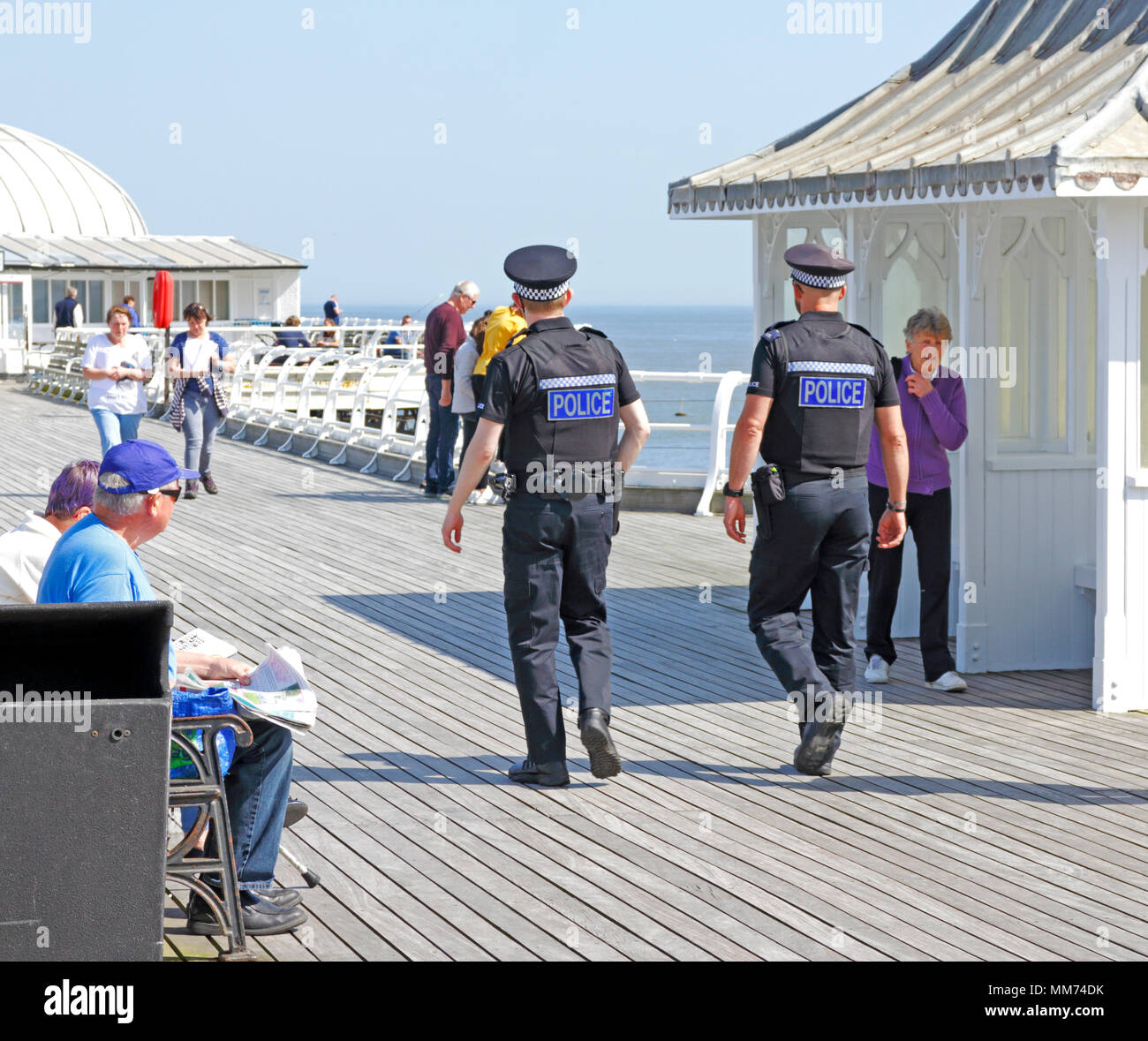 A view of Police Officers on patrol on the pier at the North Norfolk ...