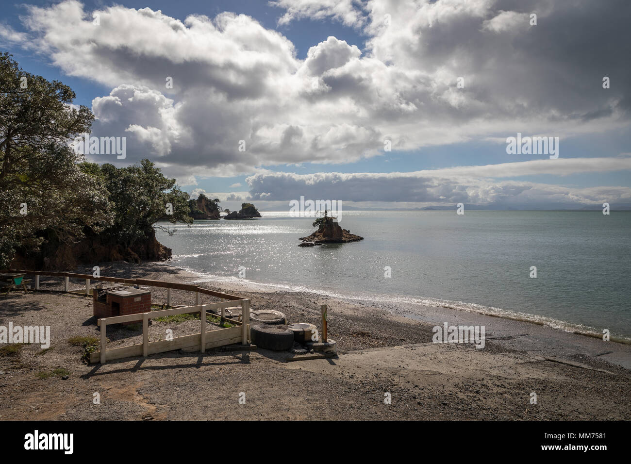 Little island in bay on sunny day Stock Photo - Alamy