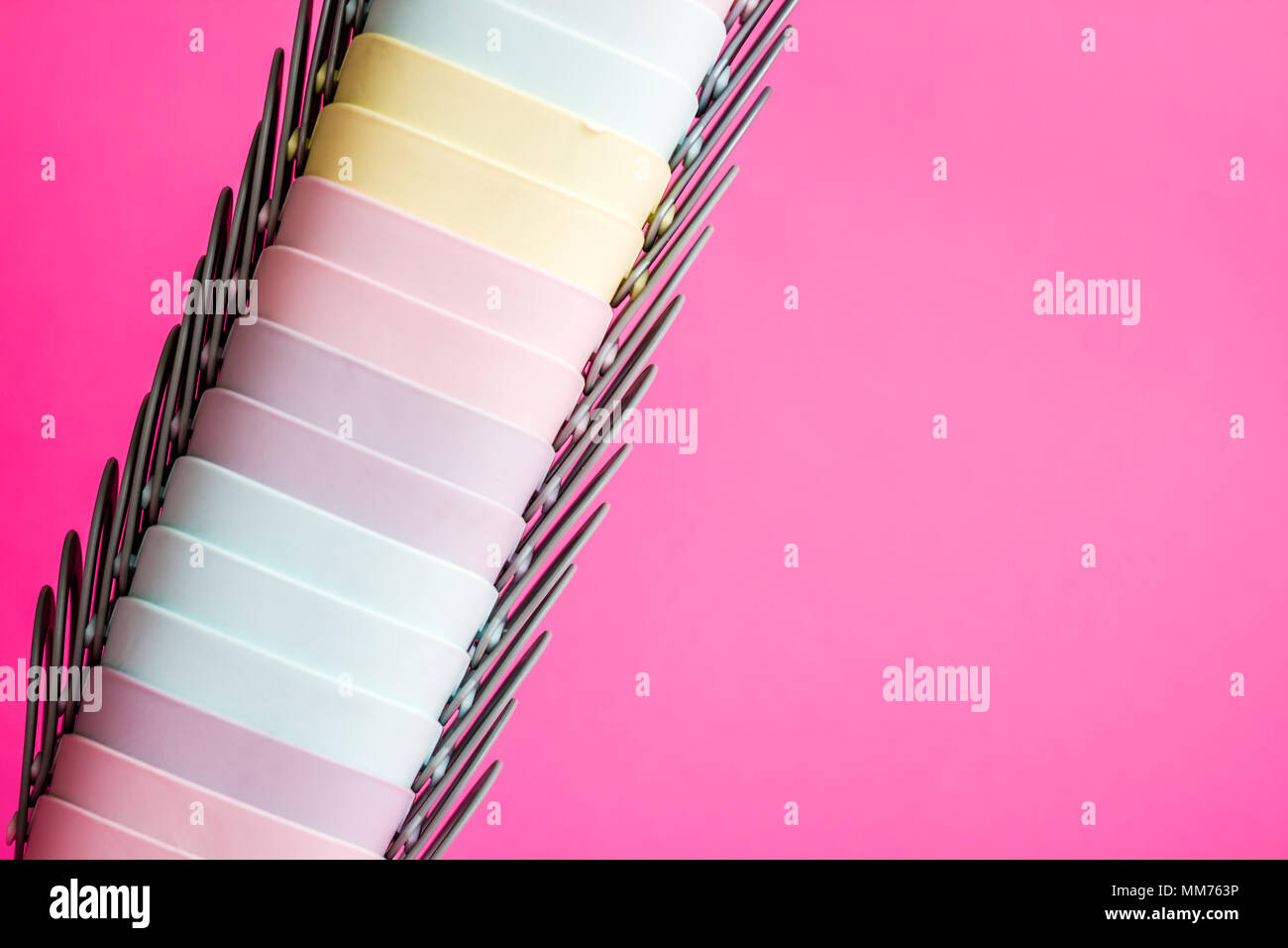 Colorful mini plastic bags with handles on pink background Stock Photo ...