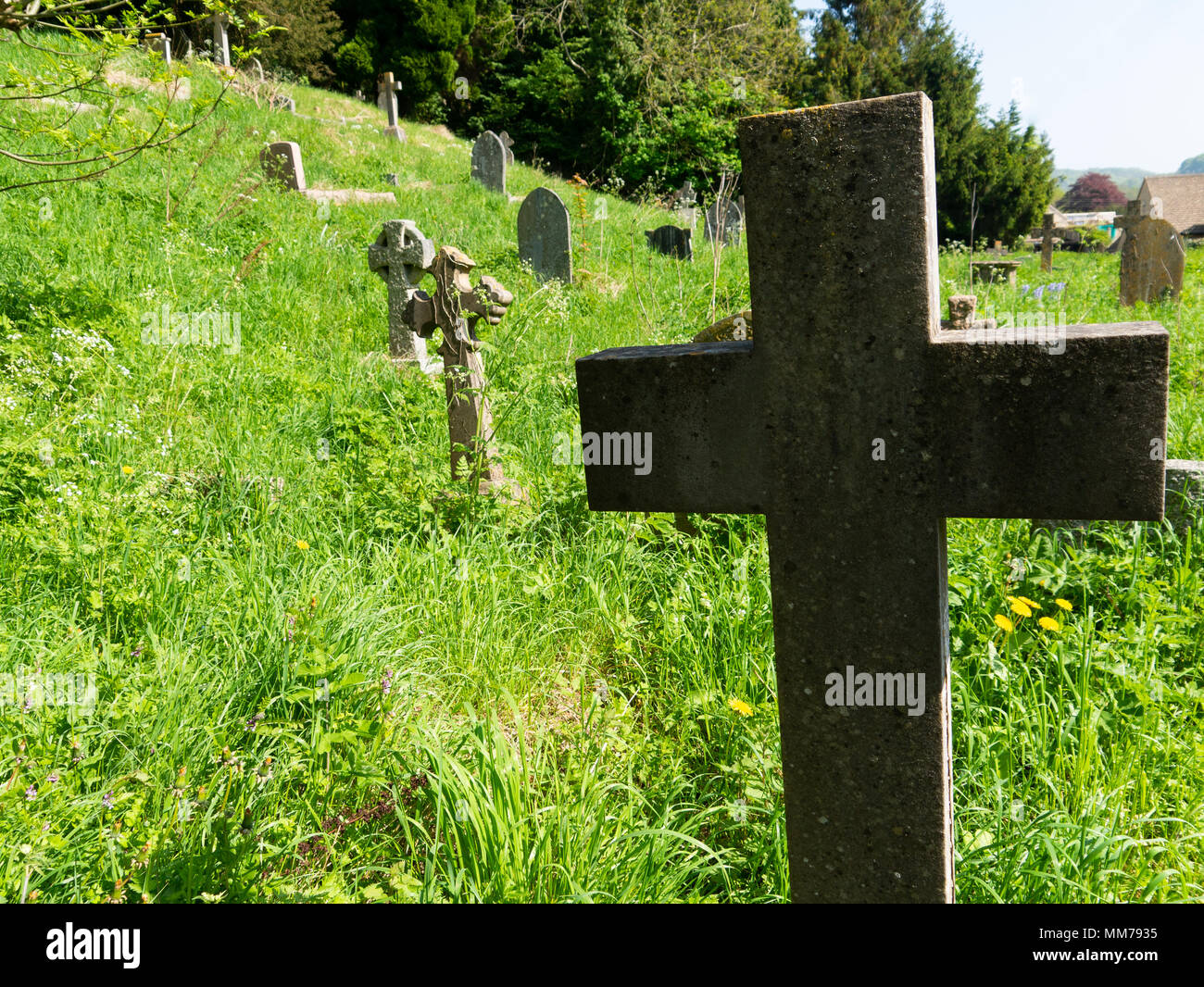 Graveyard of Holy Trinity church, Slad, Gloucestershire, UK Stock Photo ...