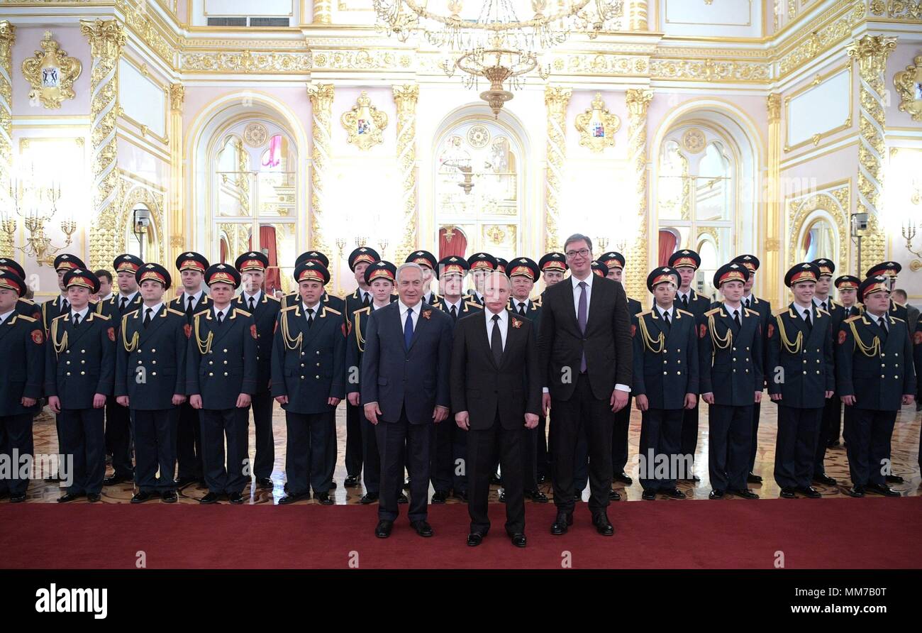 Russian President Vladimir Putin, center, stands with Israeli Prime ...