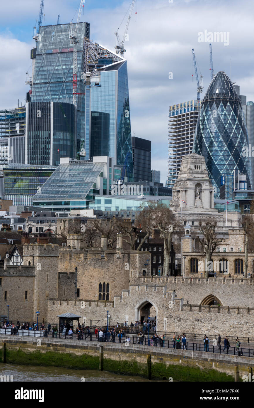 the city of london skyline with the tower of london and financial ...