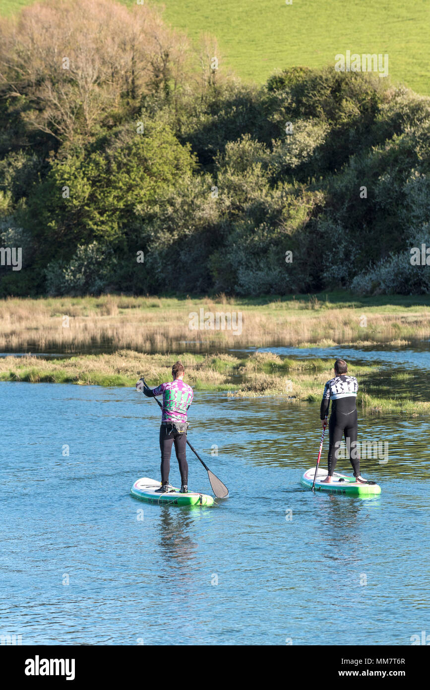 Stand up paddleboarders on the Gannel River in Newquay Cornwall Stock ...